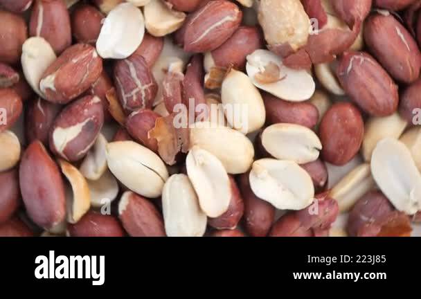Close-Up View of Raw Shelled Peanuts for Culinary Use Stock Video Footage - Alamy