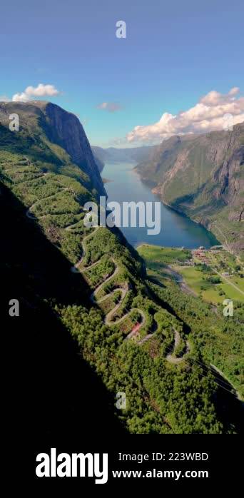 Experience the awe of Norways natural beauty as winding roads trace ...