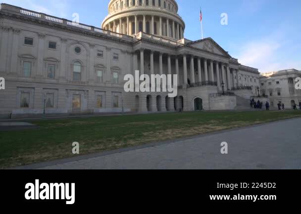 dome and columns of the Capitol under a blue sky in Washington, D.C ...