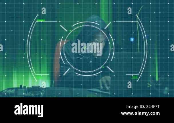 Hacker working on computer, digital targeting animation over green grid ...