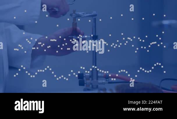 Adjusting laboratory equipment, hands over digital data points ...