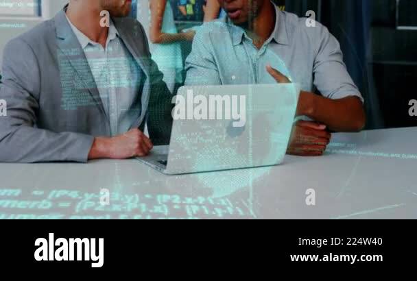 Binary code animation over business people discussing work at laptop ...