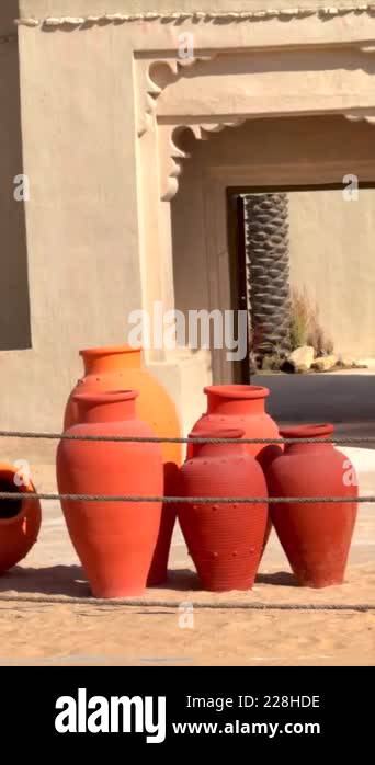 Traditional desert pottery highlights clay craftsmanship with backdrop ...