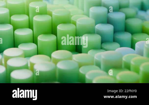 Looping 3D animation of an array of jade green cylinders that randomly ... Looping 3D animation of an array of jade green cylinders that randomly ...