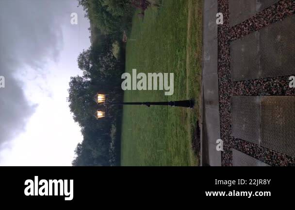 Falling rainwaters on top of a black metallic lamp post Stock Video ...