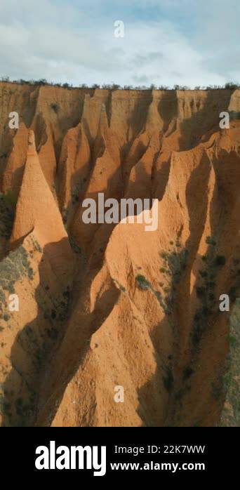 red sand and clay mountains Las Carcavas by Madrid, eroded badlands ...
