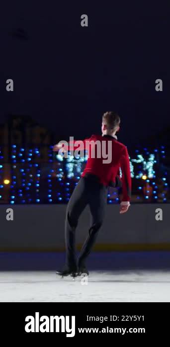 Figure skating, man pro gymnast performs a trick on ice, young man ...