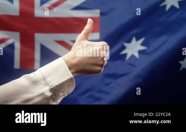 Woman Makes Hand Sign Like, Thumb Up Gesture on australian flag ...