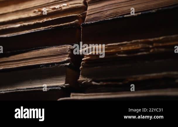 Macro view of saved medieval books with ancient writings. Religious ...