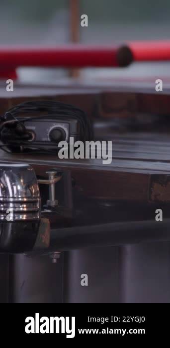 A close up view of a well used wooden workbench showcasing various ...