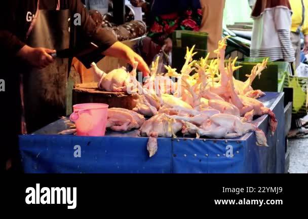 Balikpapan January 04,2025 Chicken trader at a traditional market ...