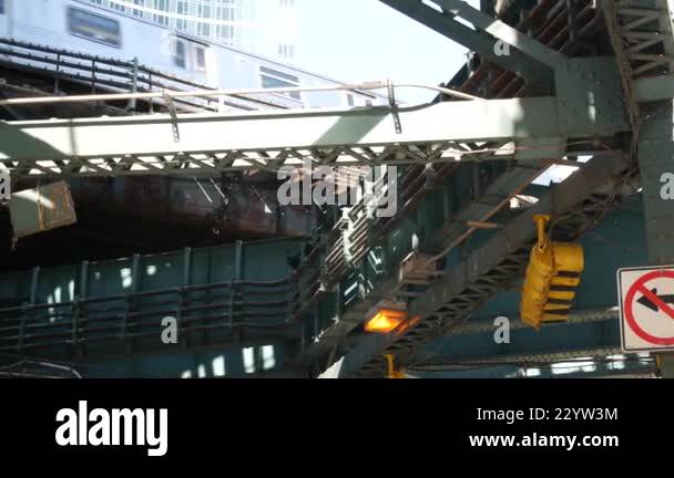 New York elevated subway, metropolitan bridge, metro track above street ...