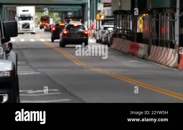 Elevated subway above New York city street. Metropolitan bridge over ...