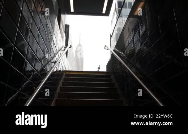 New York City underground subway metro. Empire State building ...