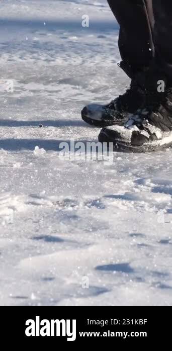Break ice, concept image of young man breaking the top layer of ice to ...