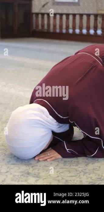 Worship In The Mosque, muslim girl prostrating, praying in islam, young ...