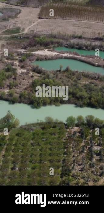 Aerial view of small ponds and islets formed on streams, farmland built ...