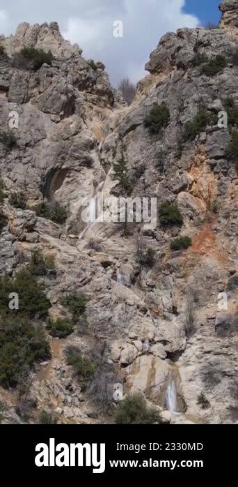 Aerial view of the natural waterfall view on sloping land, tiny ...