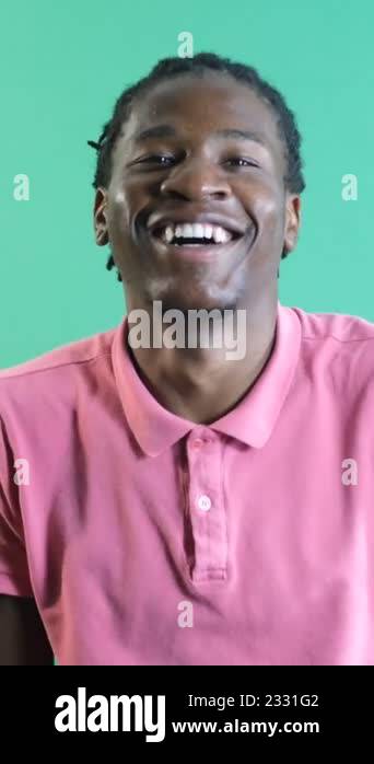 Male model laughing with pleasure, black teenager laughing happily ...