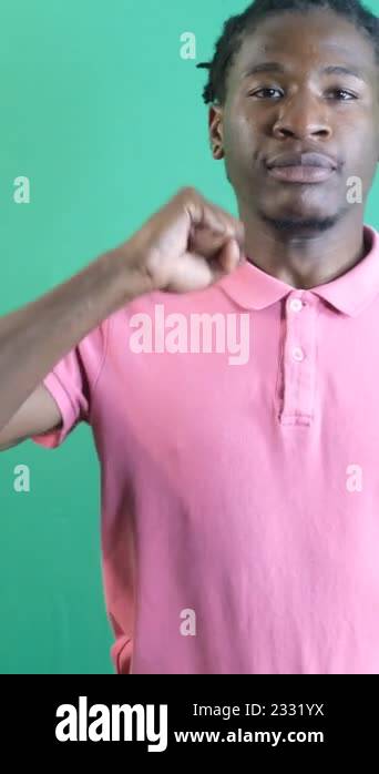 Black man making won sign, man making a win sign making a fist with one ...