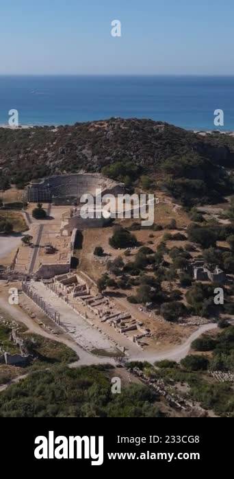 Aerial drone view of the ancient city by the sea, traces of historical ...