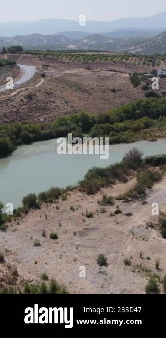 Aerial Goksu River In Turkey, water flow in the creek bed, agricultural ...