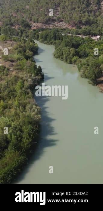 Aerial Goksu River, delta river in turkey, water flow in the creek bed ...