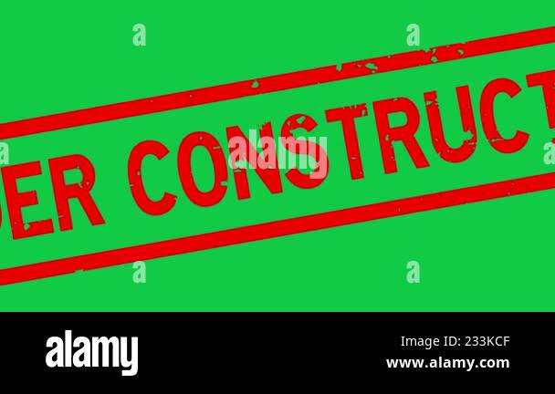 Grunge red under construction word square rubber seal stamp zoom on ...