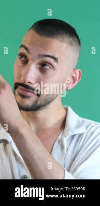 Man pointing the corner, male model showing corner icon with one hand ...