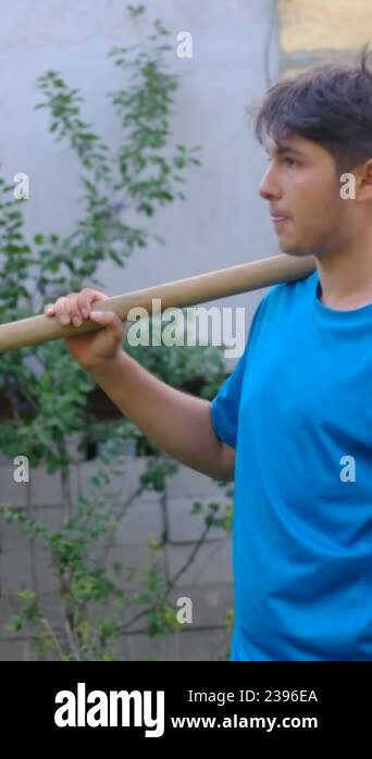 Digging field young farmer, man doing work with pickaxe, digging shovel ...
