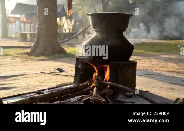 Traditional clay stove with wood fuel, Rural kitchen. Traditional ...