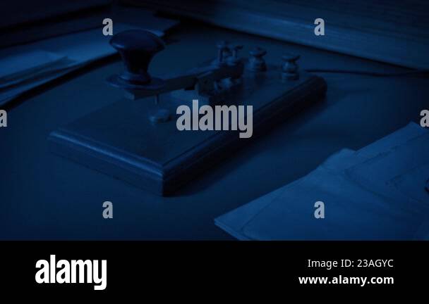 Morse Code Tapper In Dark Office Stock Video Footage - Alamy