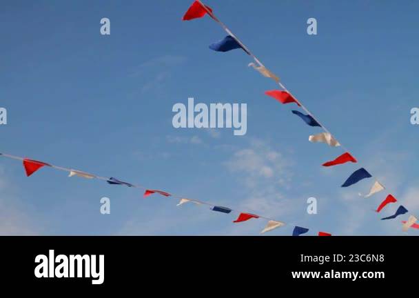 Video, Lines of Red, White and blue bunting or flags, fluttering in the ...