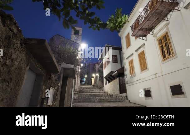 Serene evening view of a narrow cobblestone street in Mostar, Bosnia ...