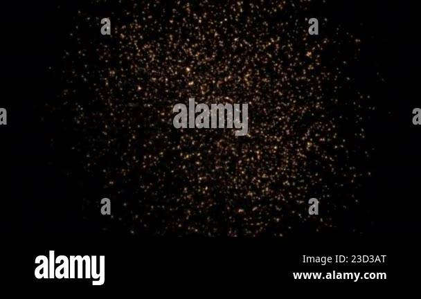 Abstract loop center glowing gold stars particles explode motion abstract on black background ...