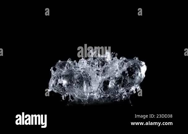 Super Slow Motion Shot of Water Splash Isolated on Black Background at ...