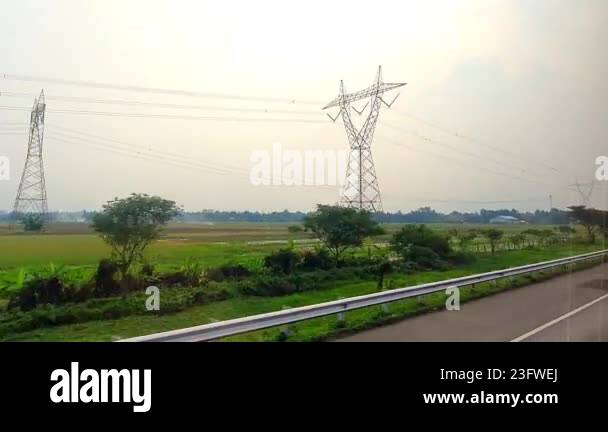 POV of sightseeing a landscape through the window from inside a moving ...