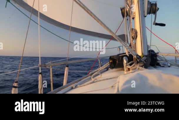 Rolling furler genova sail set on a sailboat sailing across the Bay of ...