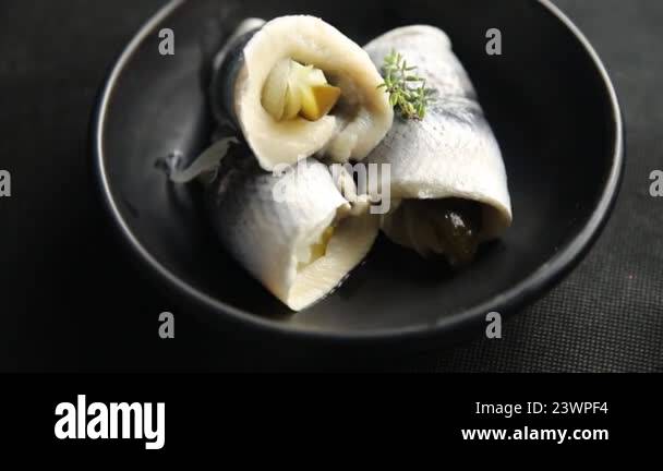 Rollmops herring roll with onion and pickles appetizer fresh tasty food ...