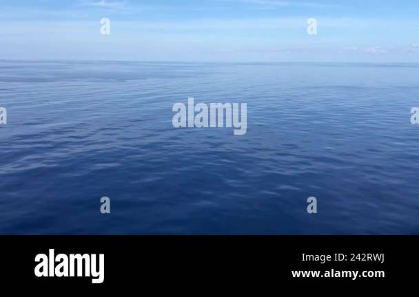Blue ocean sea horizon as far as the eye can see One part sky, one part ...