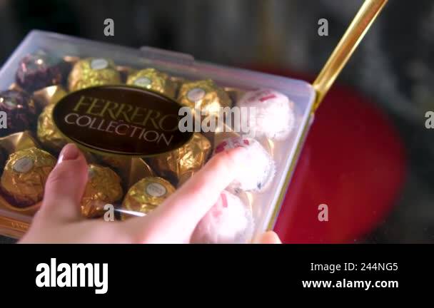 open the box Ferrero collection chocolate products. Ferrero Rocher is ...