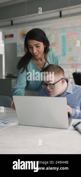 Latina female helps, teach newcomer with tasks and administrative ...