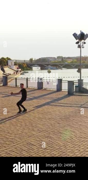 Modern boy dancer is dancing in the street. Urban lifestyle. Hip-hop ...