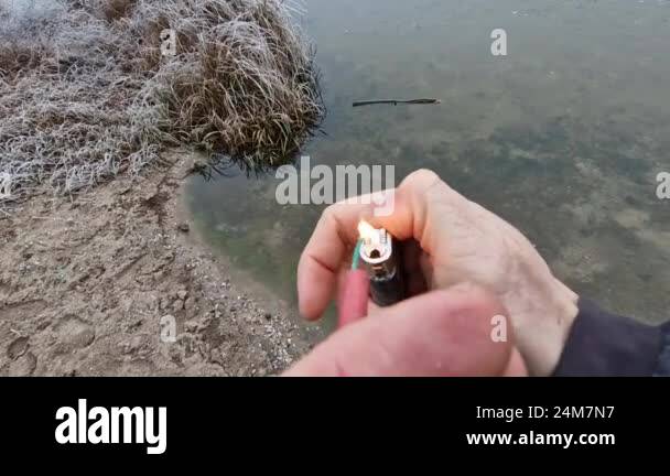 throwing firecrackers into the water. the explosion sounds muffled. the ...