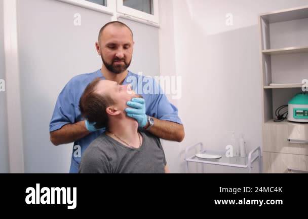 Cervical treatment, Chiropractic session, Seated position. Seated male ...