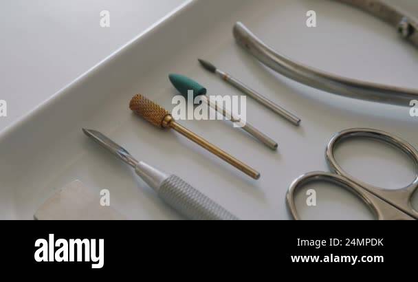Sterile professional manicure tools on tray prepared for nail care ...
