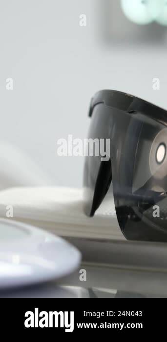 Man picks up sunglasses off office table in summer. High quality 4k ...