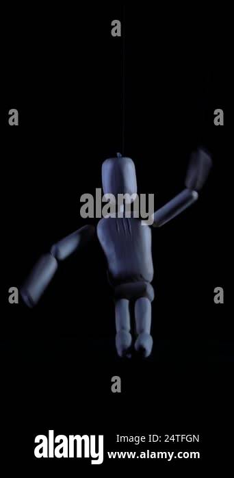 Vertical, Wooden mannequin suspended in darkness. Spooky wooden figure ...