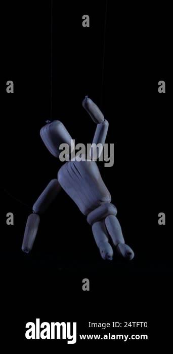 Vertical, Wooden mannequin suspended in darkness. Spooky wooden figure ...