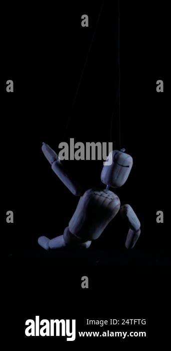 Vertical, Wooden mannequin suspended in darkness. Spooky wooden figure ...